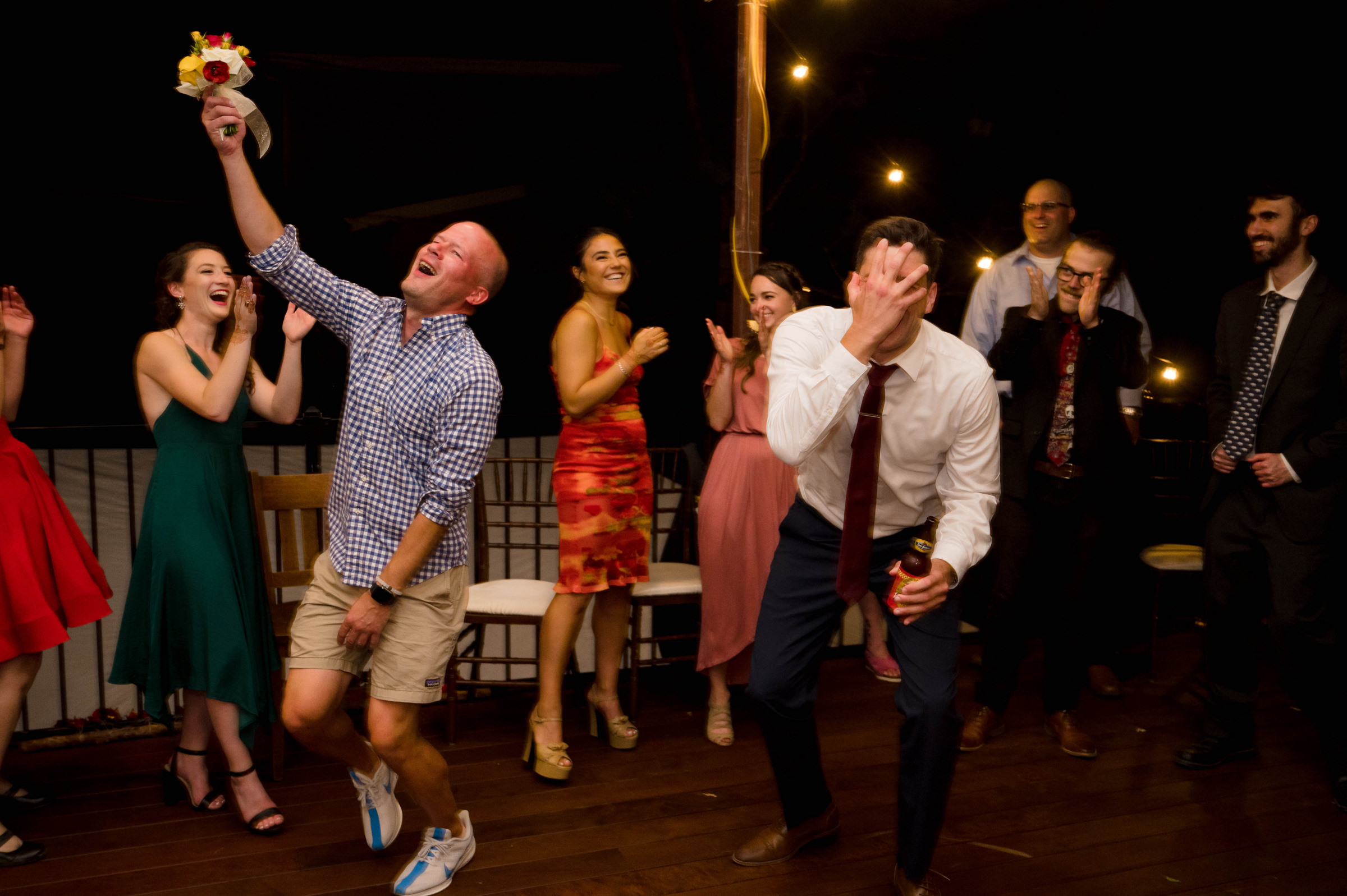 Guests at mock bouquet toss - photo by Joe Appel Photography
