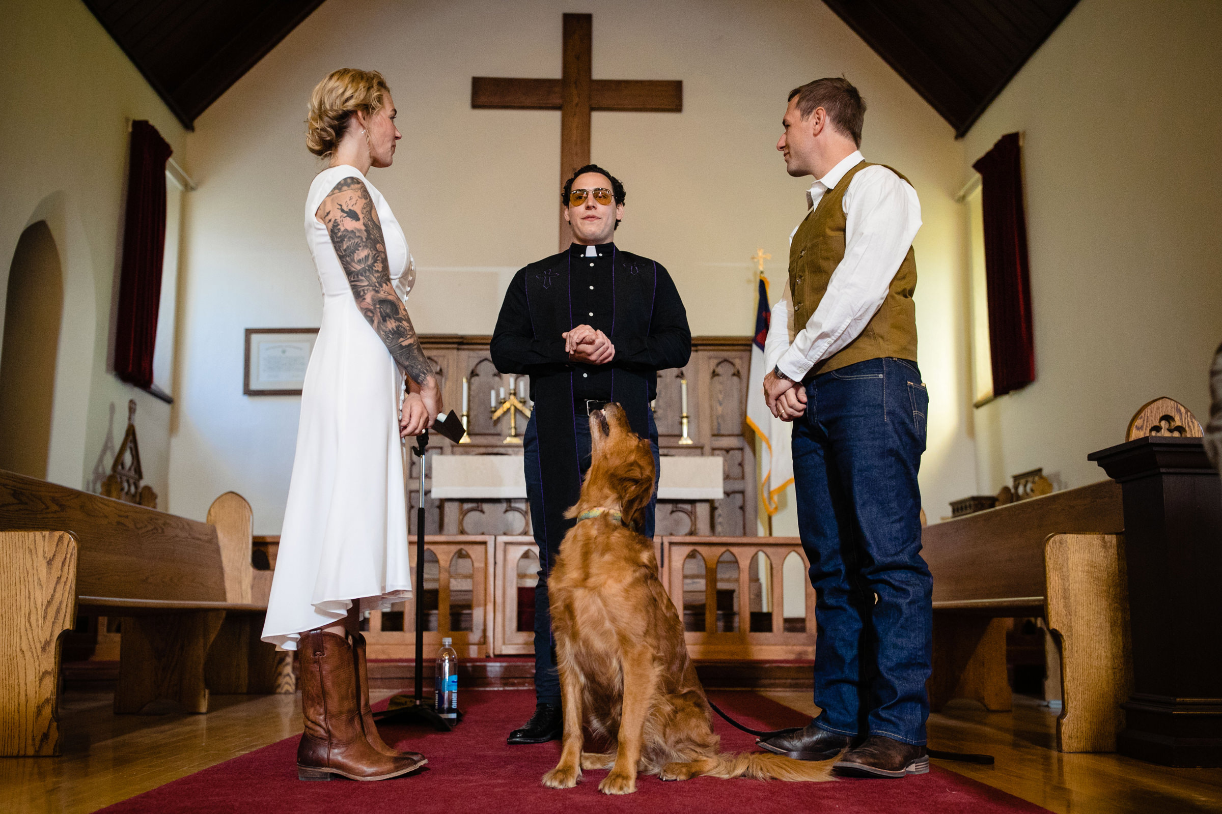 Ceremony with priest and dog - photo by David Clumpner