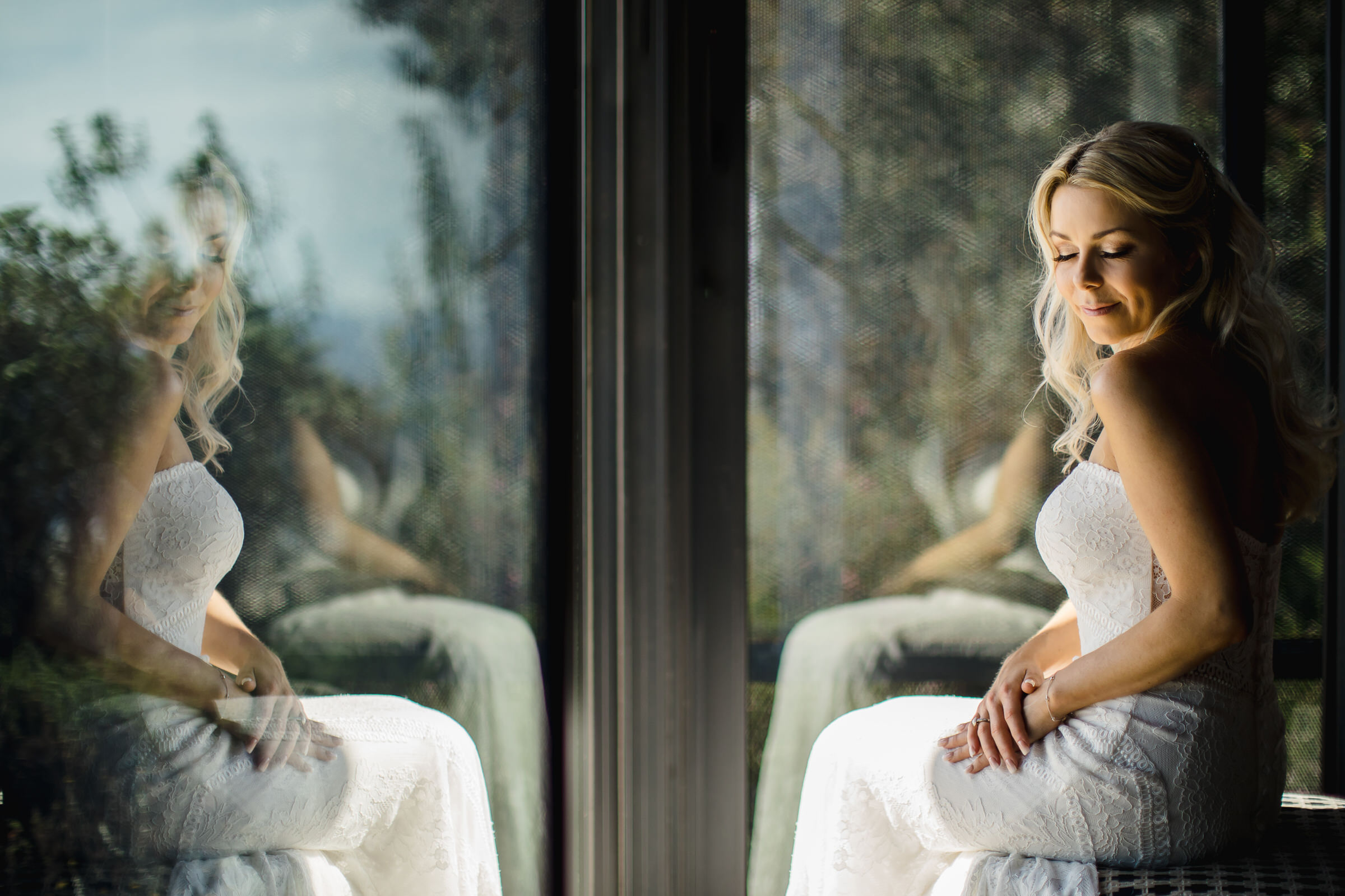 Bride in window light with reflections - photo by Ruan Redelinghuys ...