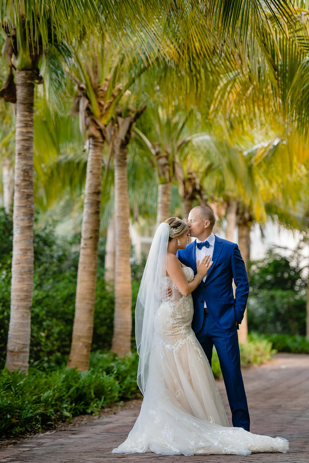 Couple pose under palms Isla Bella Beach Resort Florida Keys - photo by ...