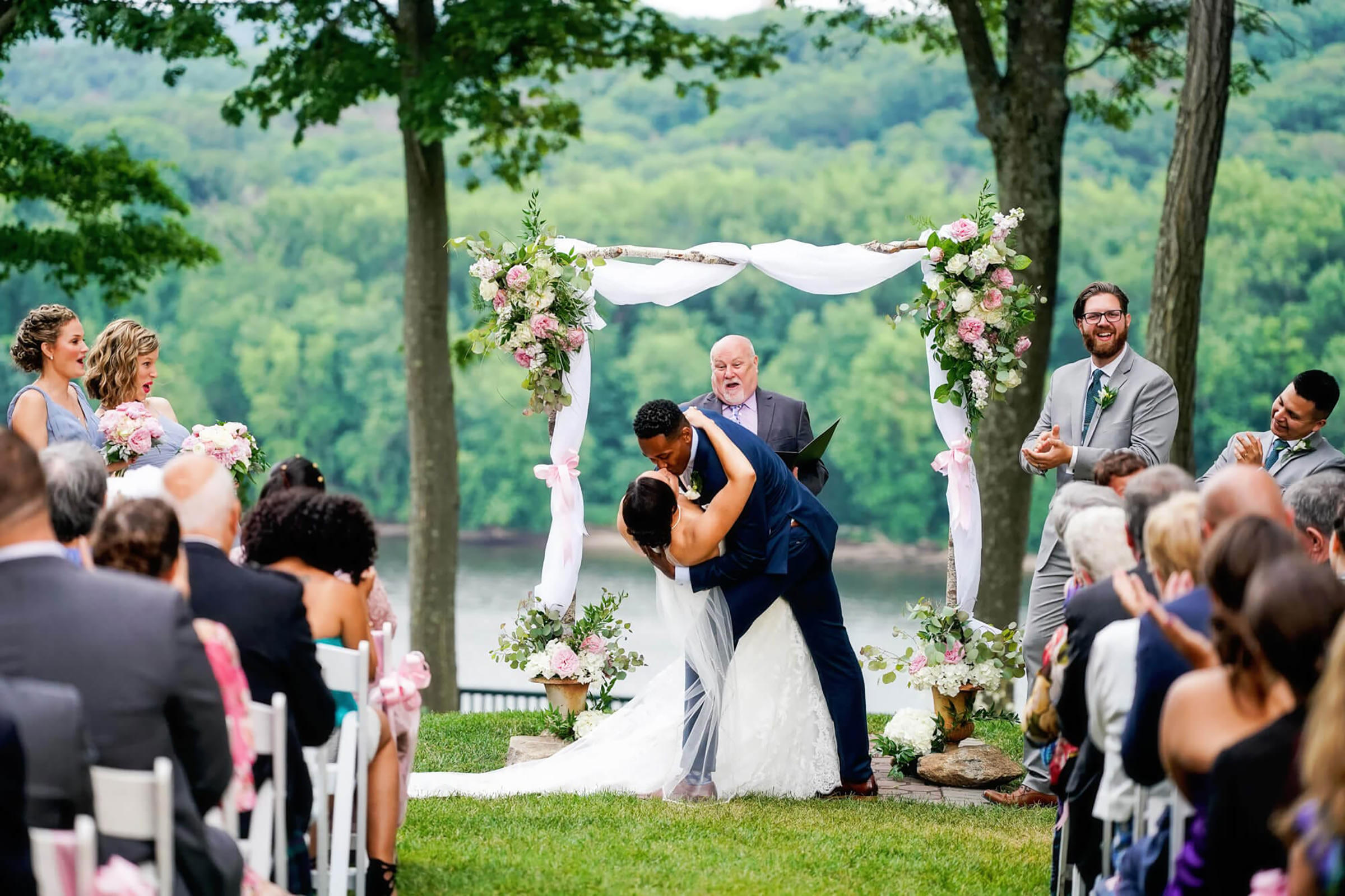 Dipping the bride for ceremonial kiss - photo by Kate McElwee Photography