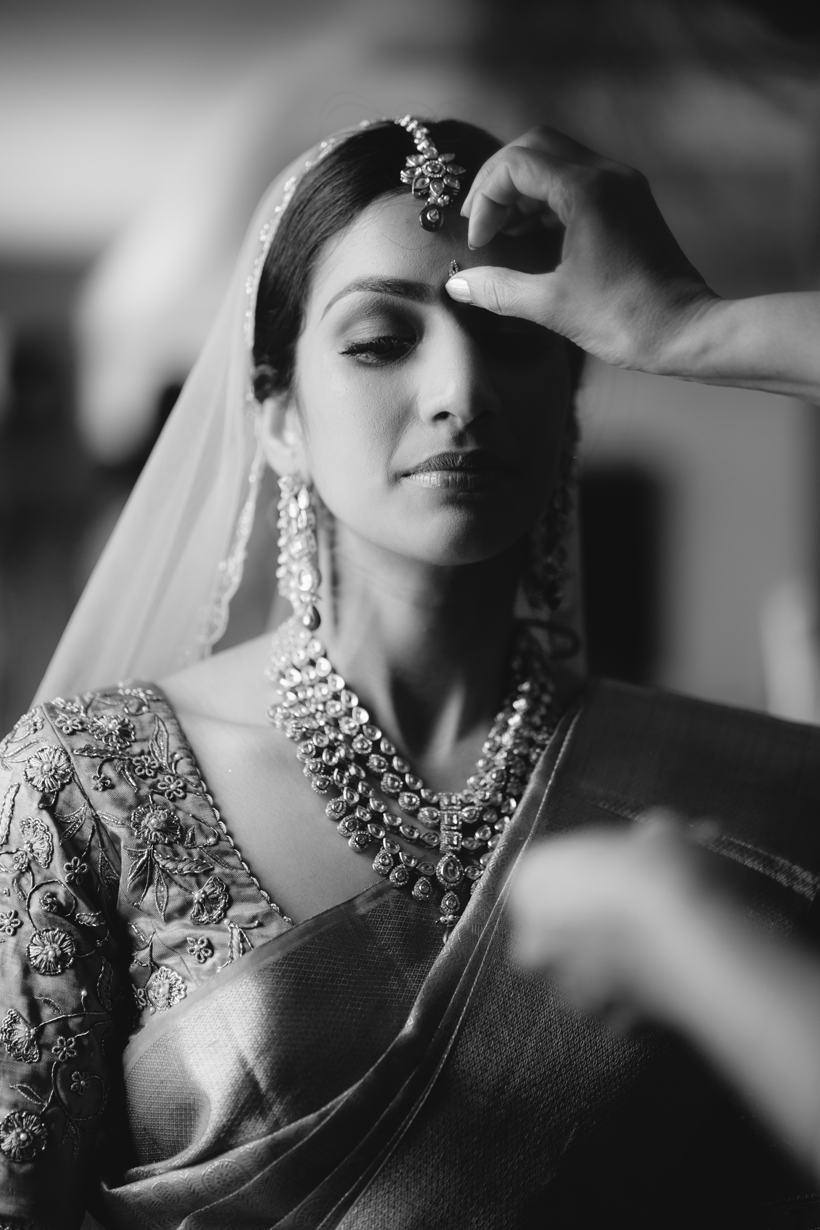 Bride receiving bindi - photo by Joe Payne Photography