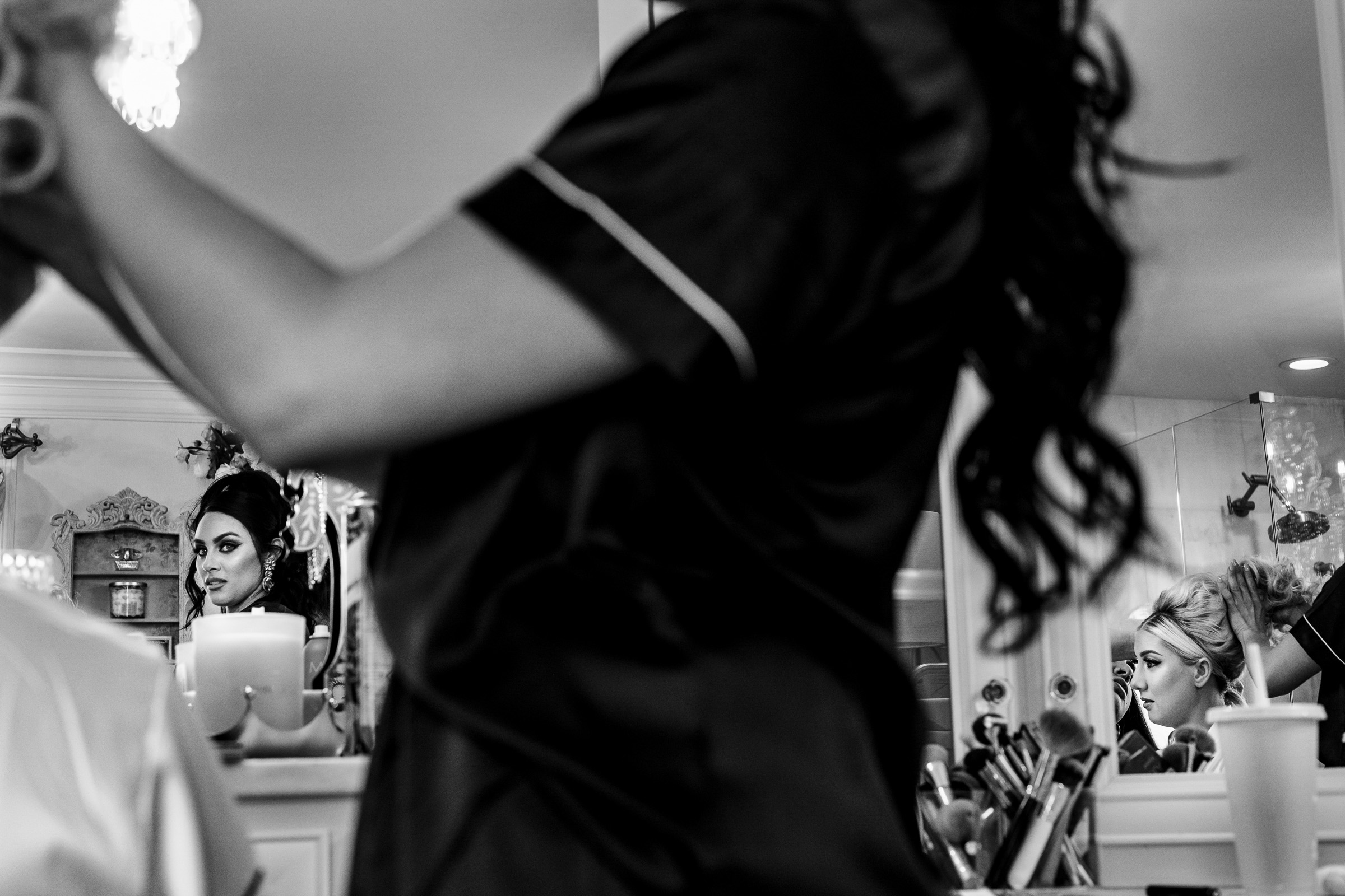 Salon shot getting ready in reflections - photo by Andrew Alwert Studios