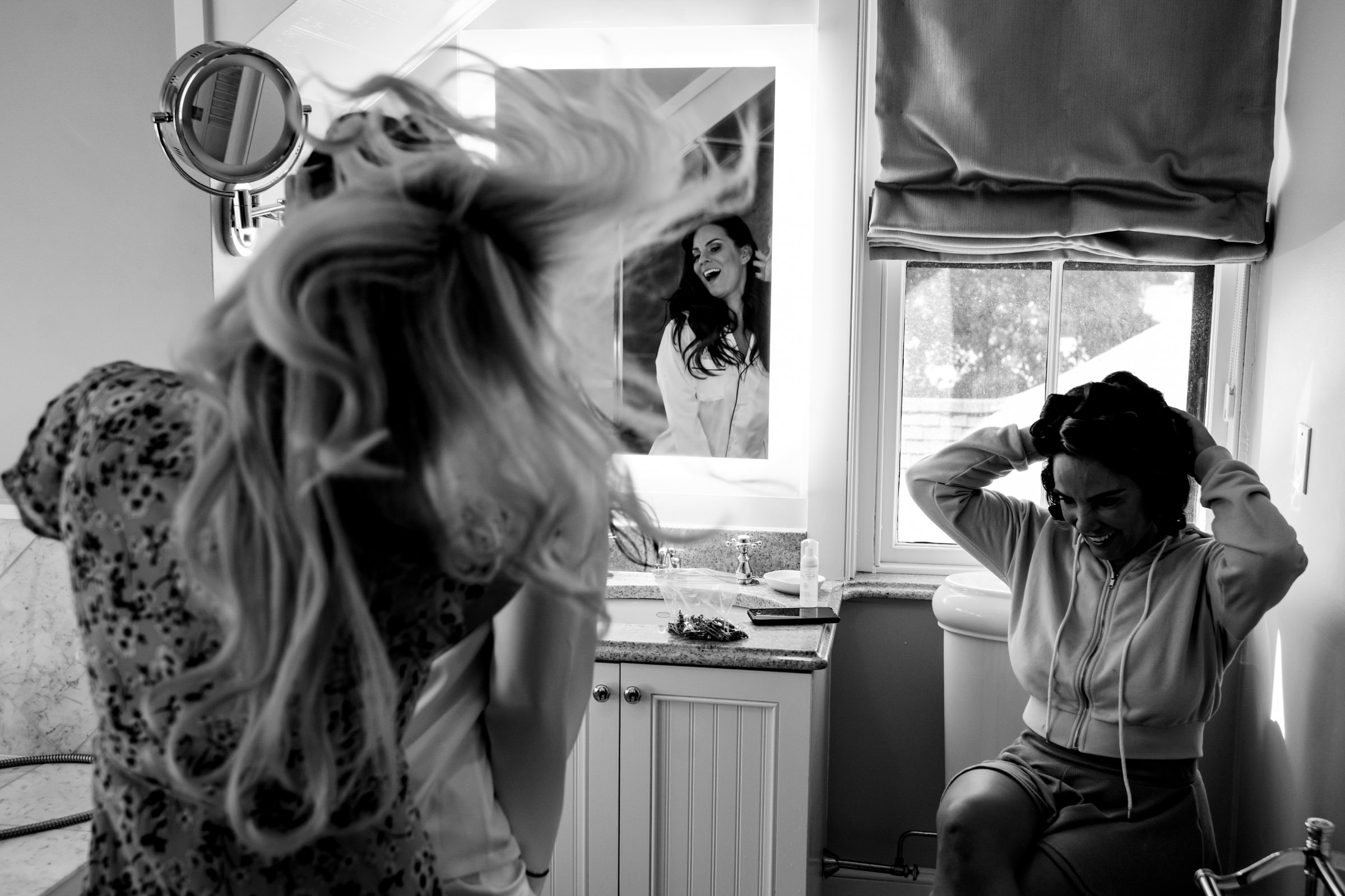 Getting ready with blowing hair - photo by Stefy Hilmer Photography