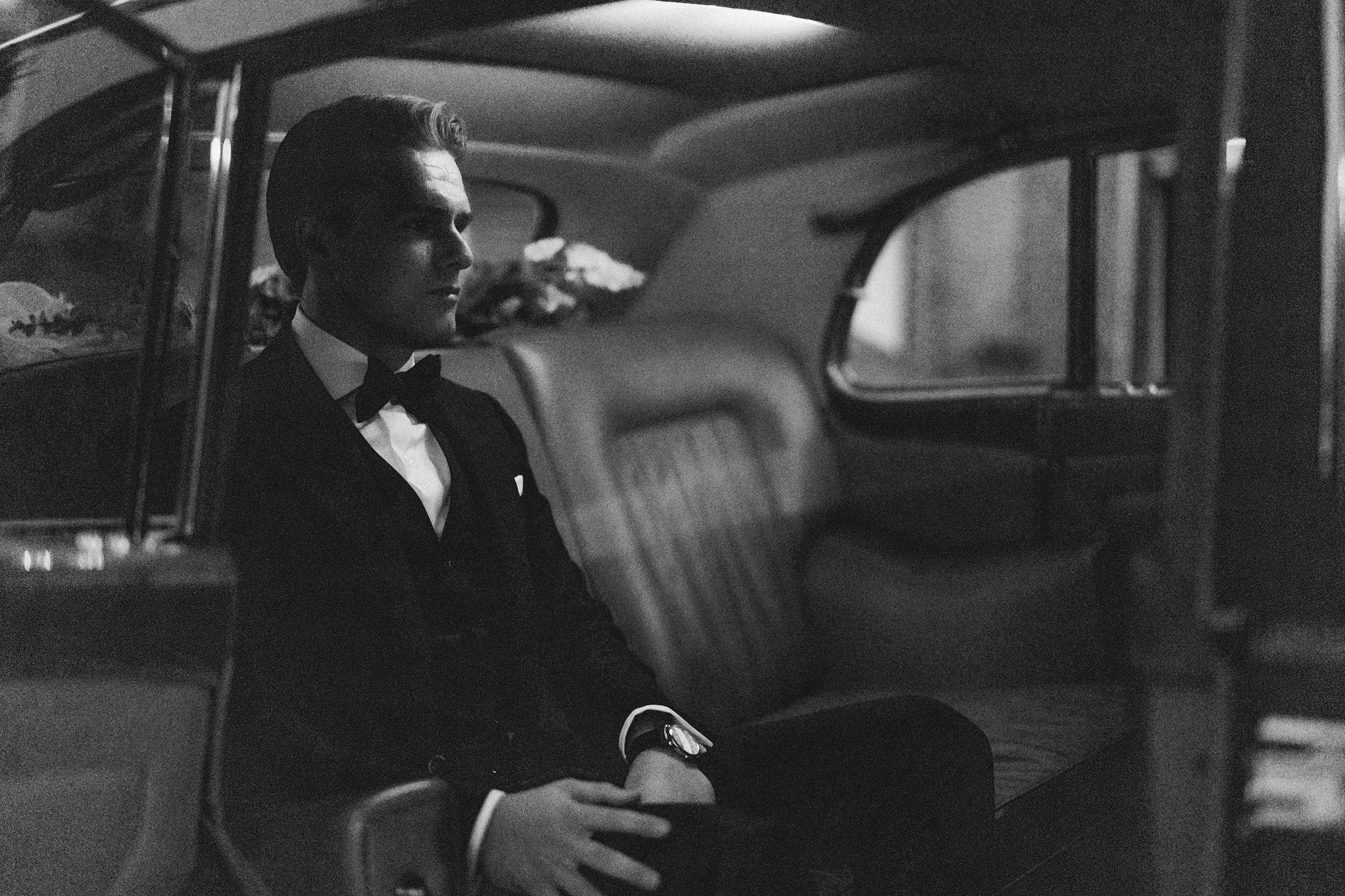 Groom seated in vintage limo - photo by Peter van der Lingen Wedding ...