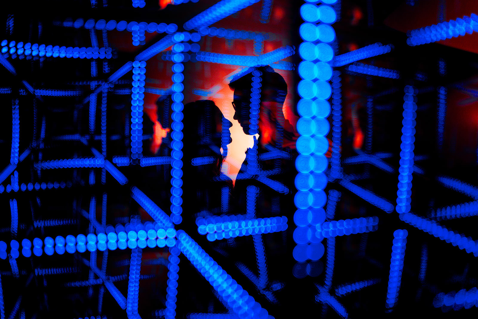 Silhouette couple in geometric setting - photo by Vinson Images