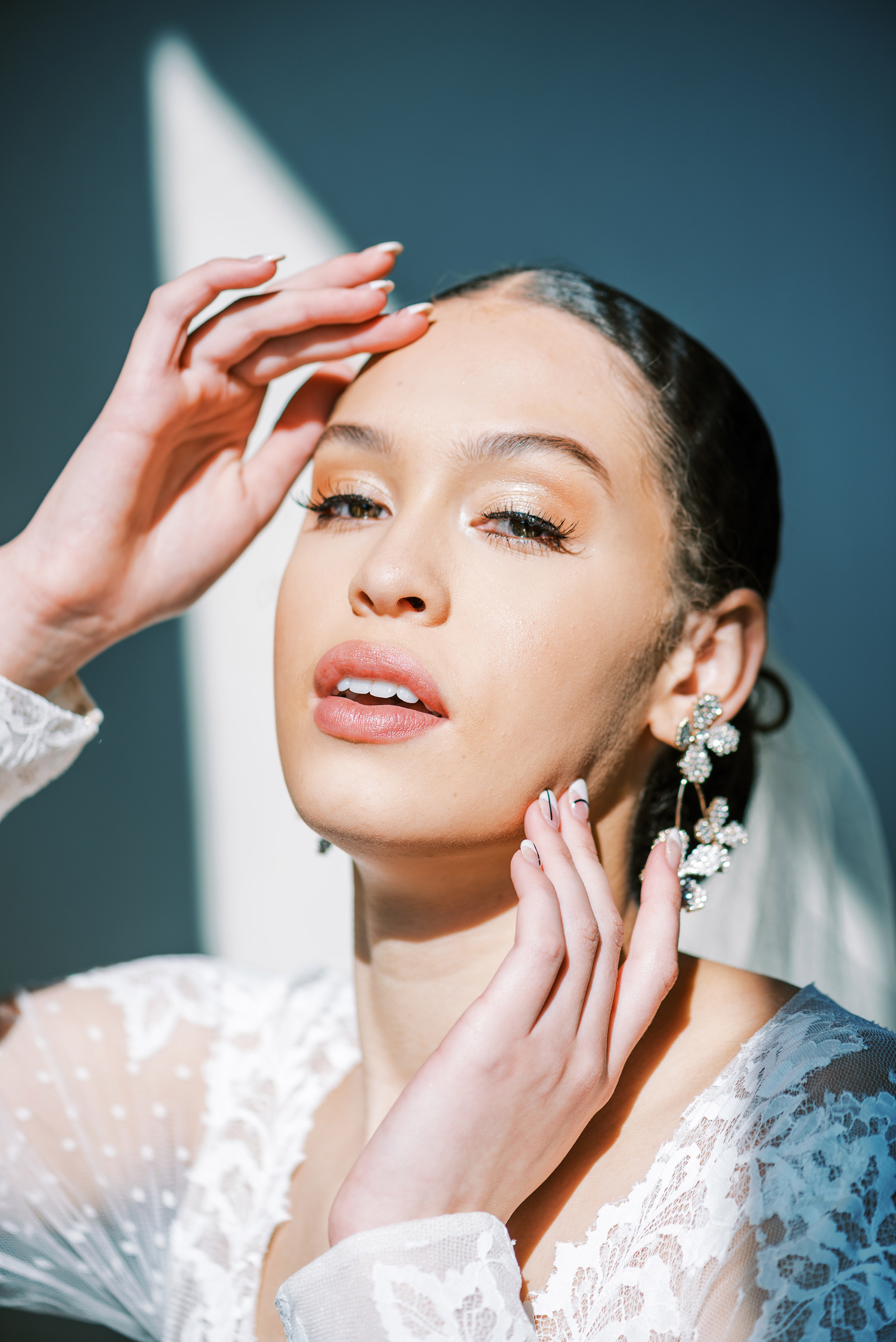Bride portrait in light - photo by Steib Weddings