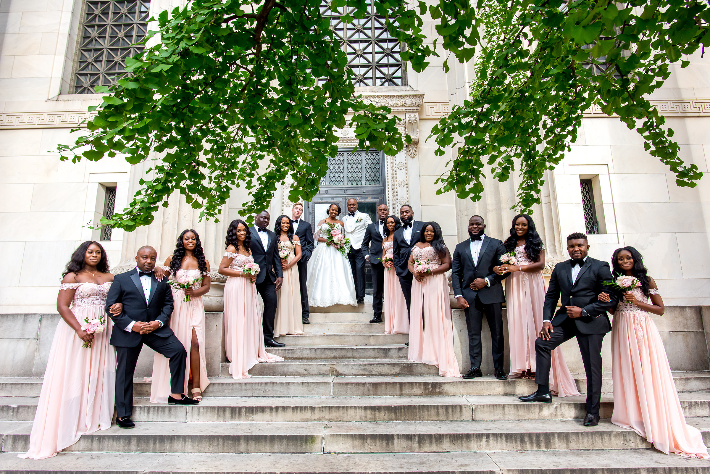 Formal group shot on steps, photo by Adibe Photography