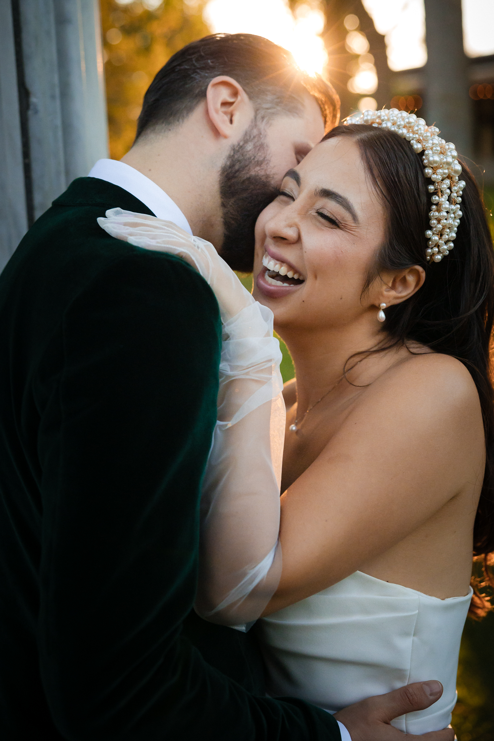 Couple portrait with laughing bride, photo by Alecia Patrick