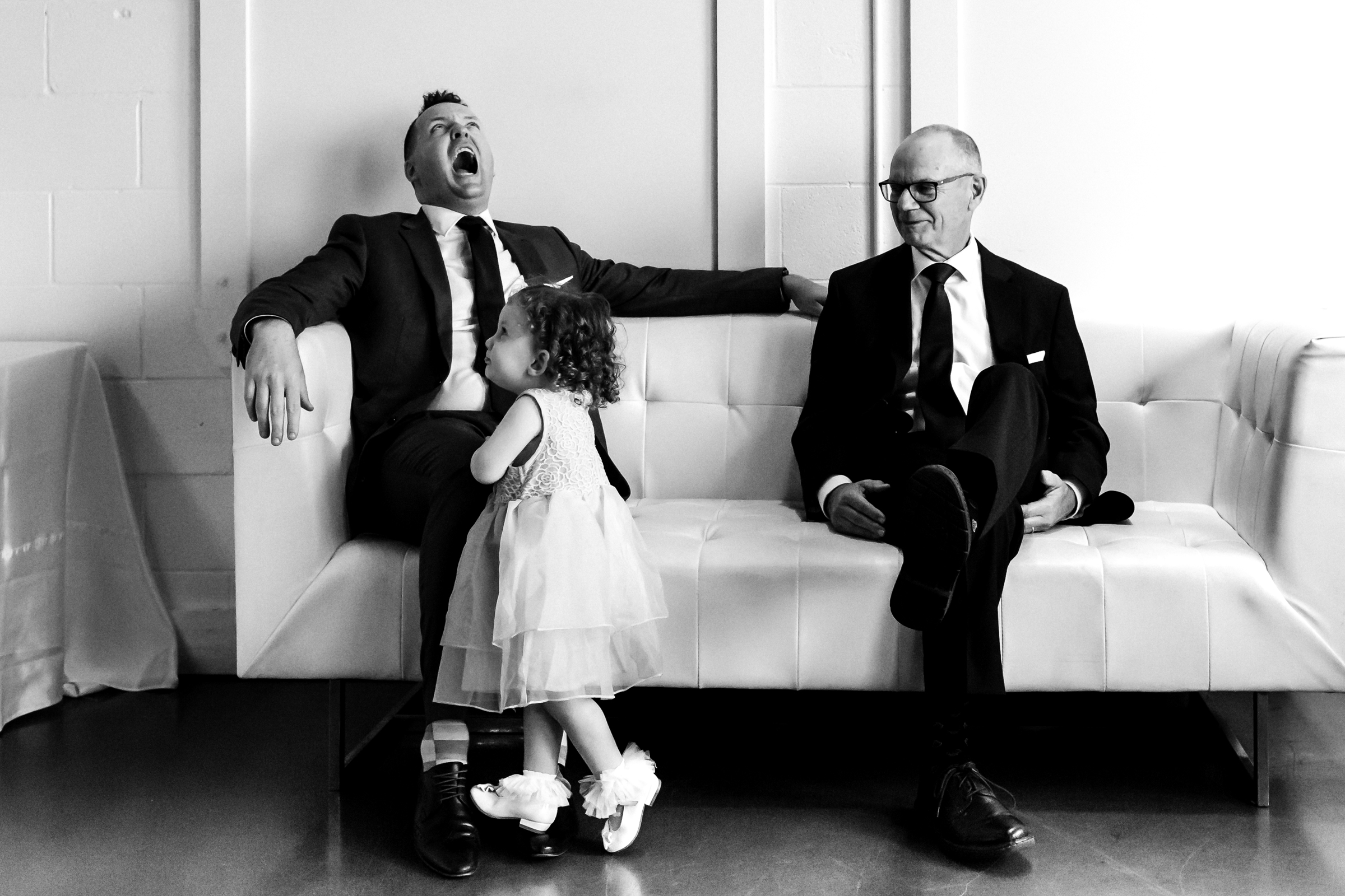 Funny moment of little girl with father and grandfather, photo by ...