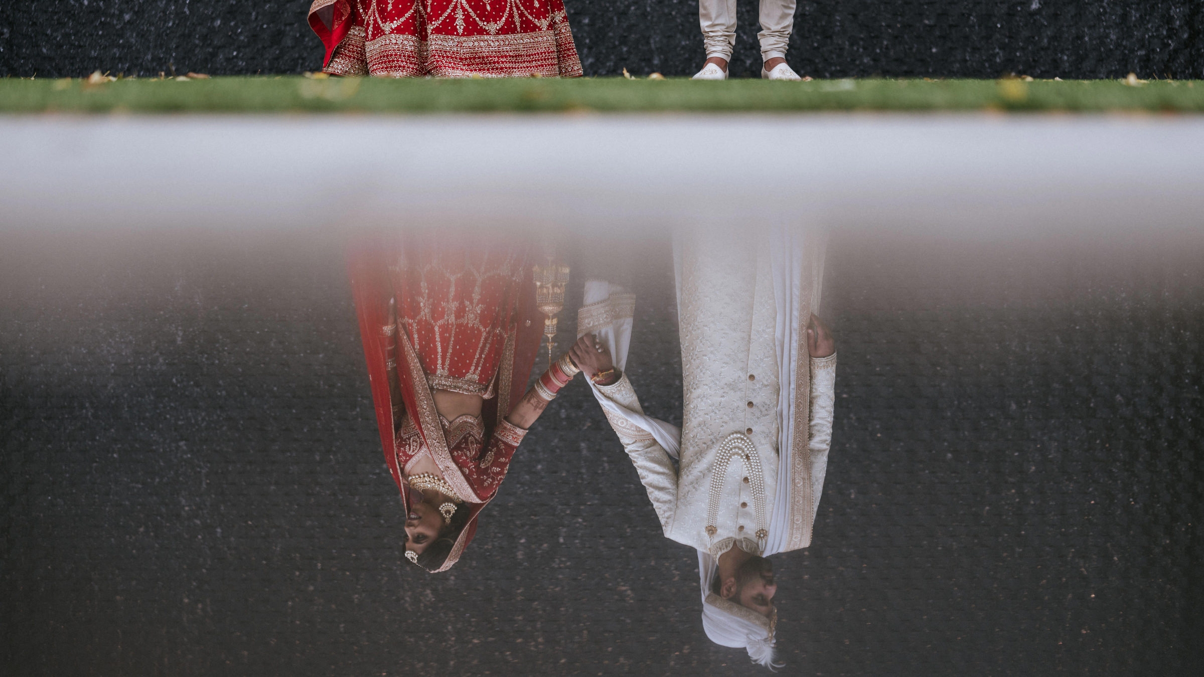 water reflection of bride and groom, photo by Charmi Peña Photography