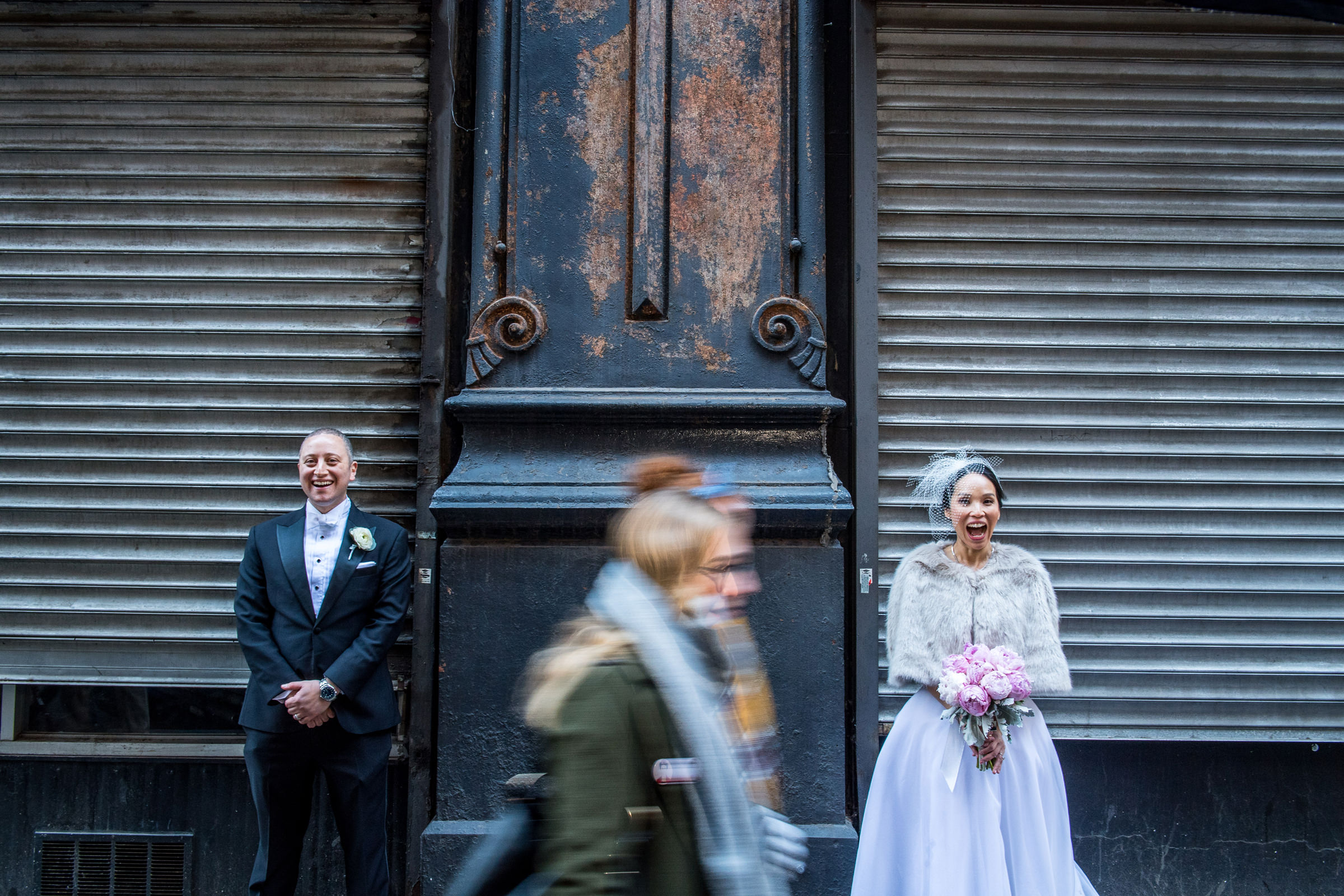 Bride and groom portrait with passerby - photo by Jeff Tisman Photography