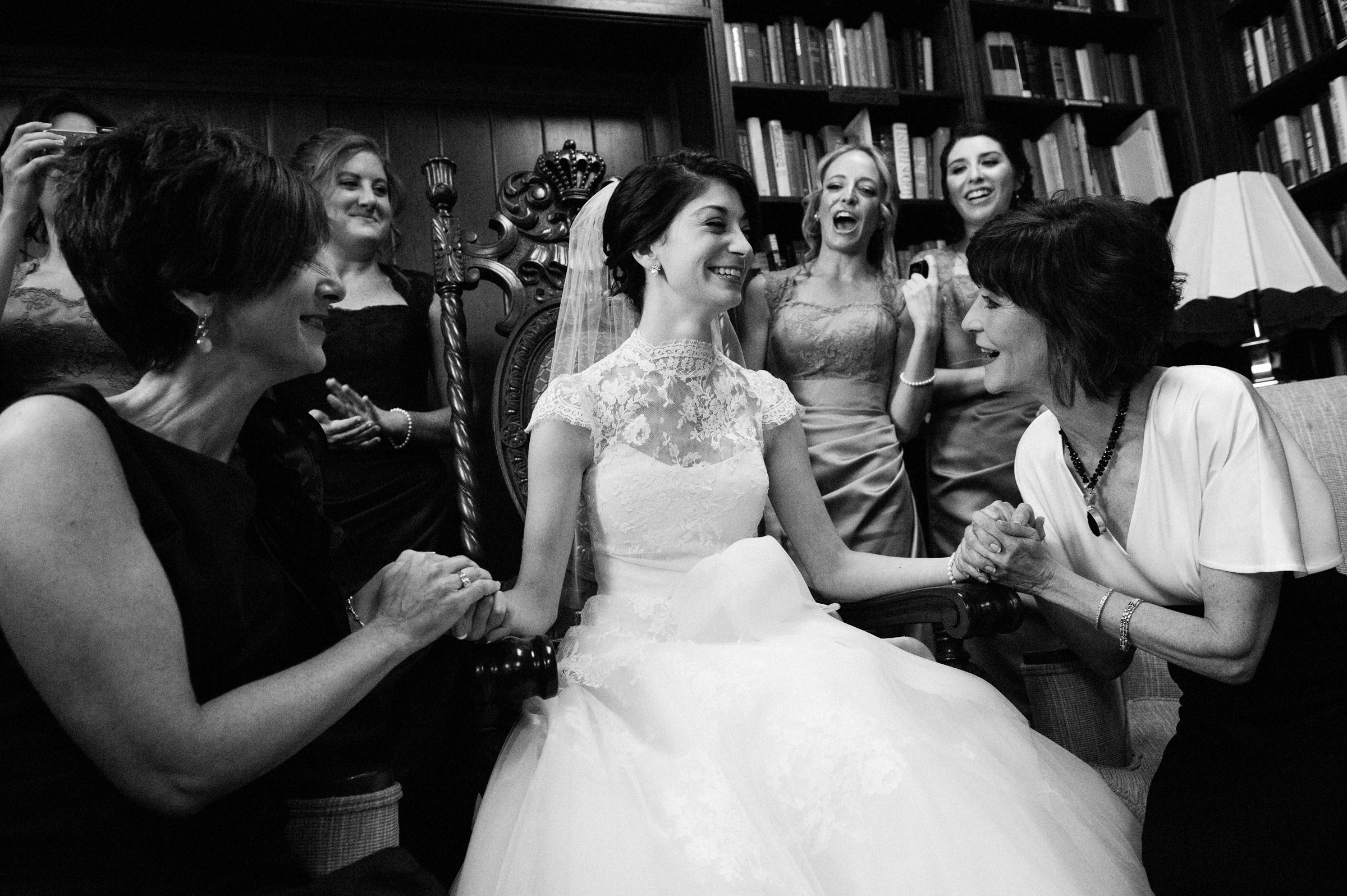Family prayer with bride at center - photo by Joe Appel Photography