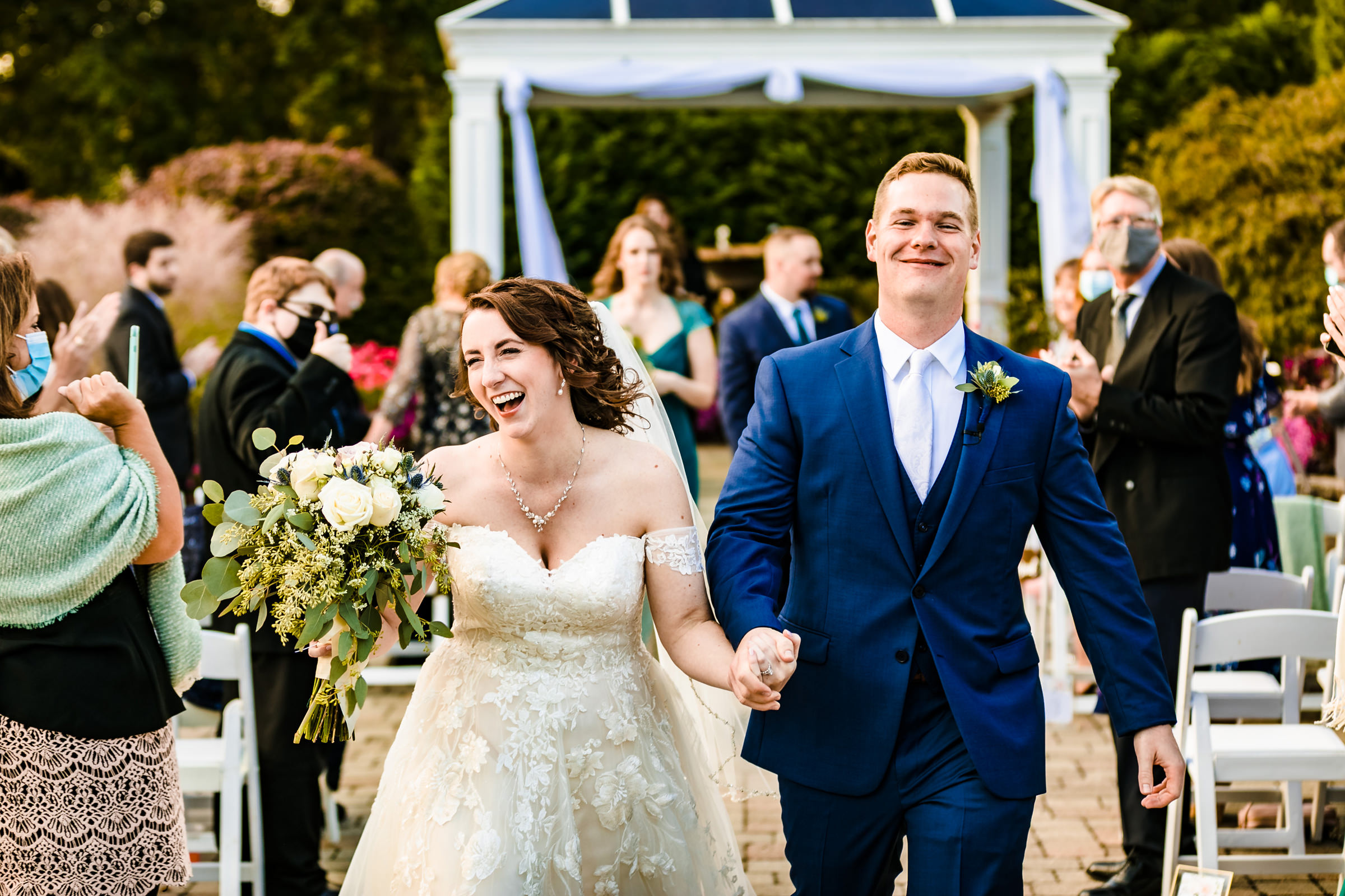 Happy just married couple leaving ceremony - photo by Daniel Nydick ...