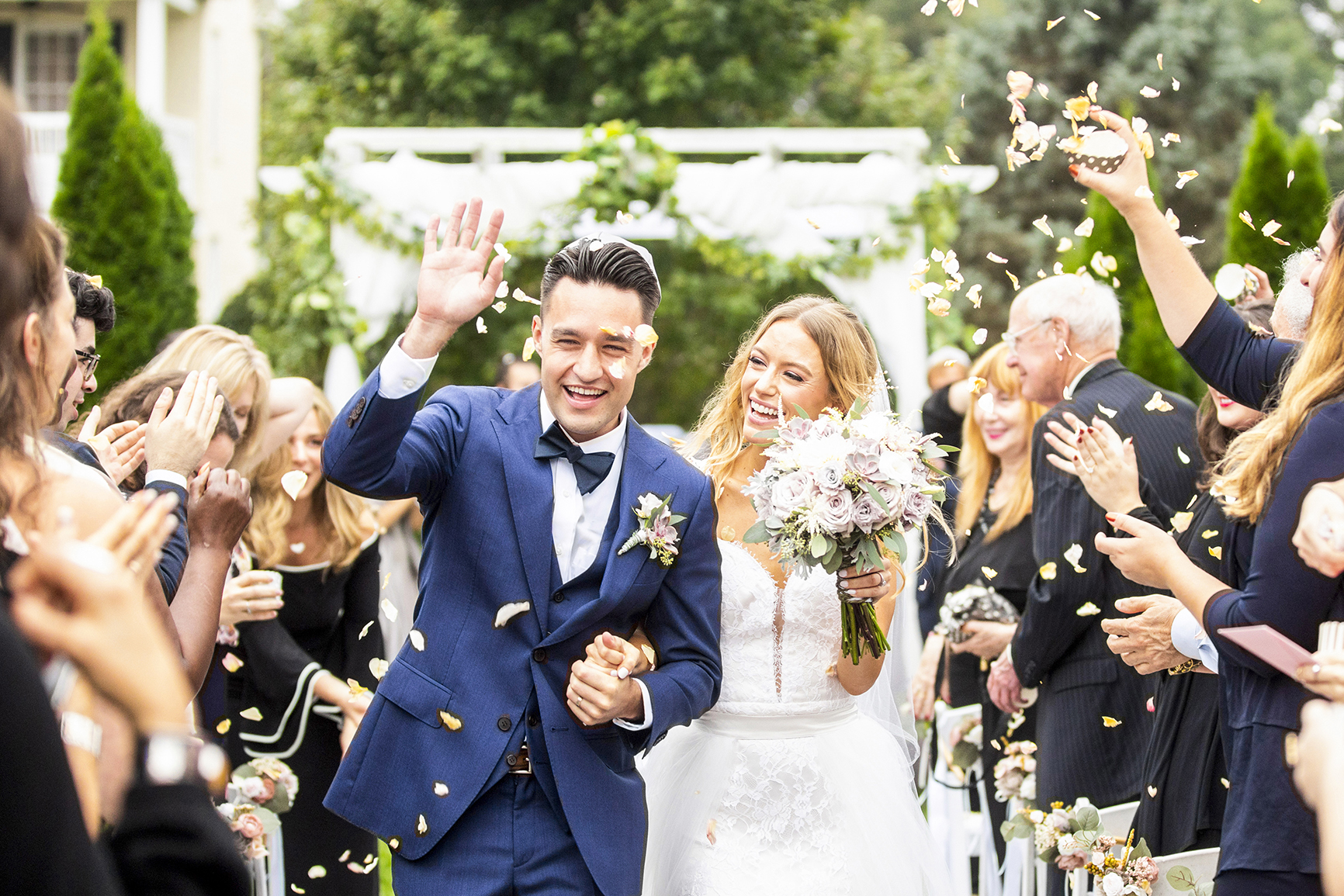 Couple recessional with confetti - photo by Anna Schmidt Photography